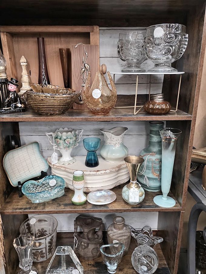 A symphony in glass and crystal, arranged with the care of a museum curator. Those delicate blue pieces would make any dinner table sing.