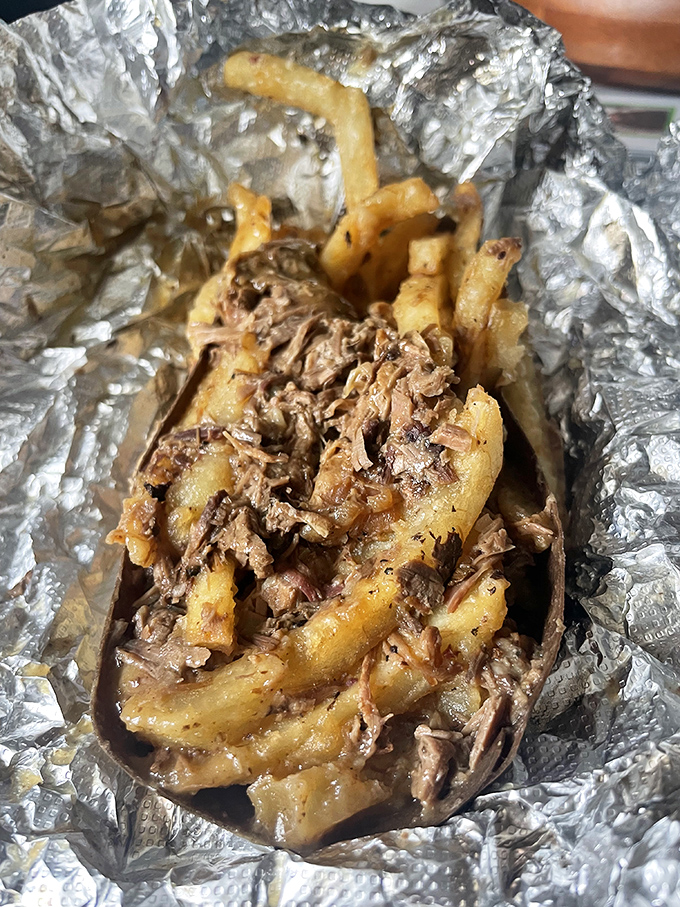 Gravy fries: where crispy potatoes go for their spa treatment, emerging transformed and glistening with beefy magnificence.