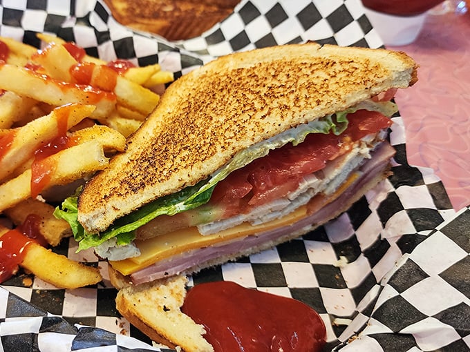 This grilled cheese sandwich isn't playing around &ndash; golden-brown bread housing a multilayered masterpiece that makes your childhood version look like amateur hour.