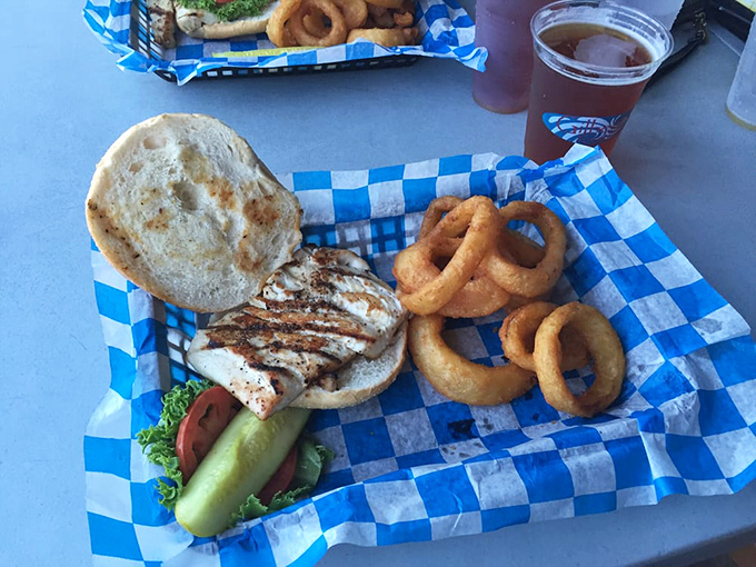 A grilled mahi sandwich that makes you wonder why you ever eat anything else. Those onion rings aren't just sidekicks.