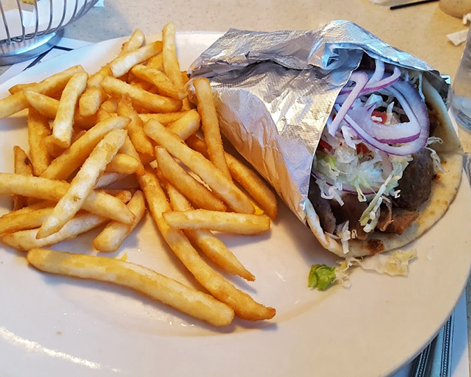 The gyro platter doesn't just transport your taste buds to Greece—it buys them beachfront property with an ocean view.