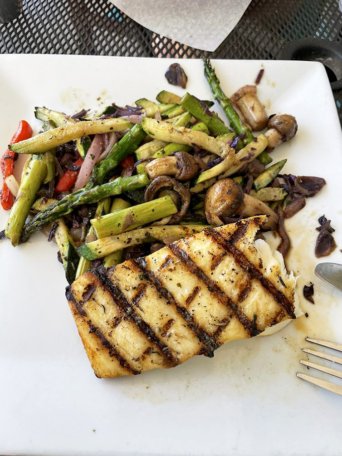 Perfectly grilled halibut with seasonal vegetables proves Idaho knows how to treat quality seafood with proper respect.