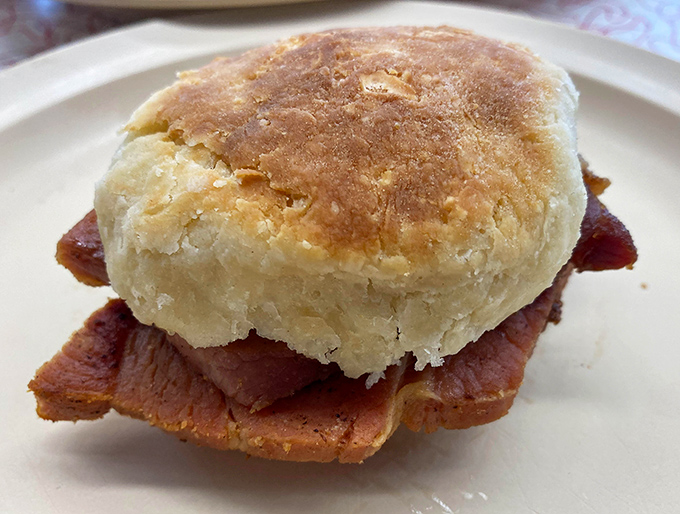 The ham biscuit&mdash;a masterpiece of simplicity where country ham meets house-made biscuit. No fancy garnishes needed when the basics are this perfect.