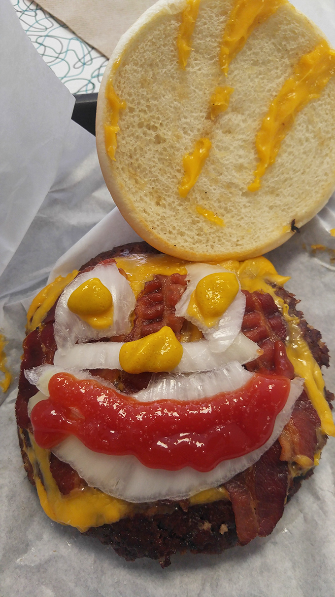 A burger that smiles back at you. When your food has a face this friendly, you know you're in the right place.