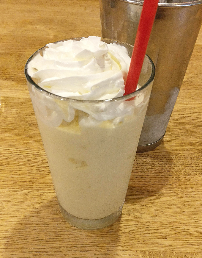 The milkshake that launched a thousand return visits, served old-school style with the mixing cup alongside&mdash;because one glass is never enough.