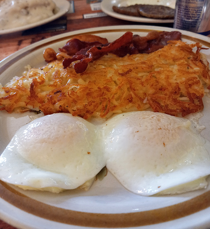 Golden-brown hashbrowns that crackle with each bite, paired with eggs so perfectly cooked they deserve their own fan club.