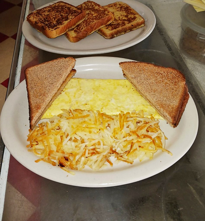 French toast upstairs, hash browns downstairs&mdash;this breakfast party has everything you need, including that perfect golden-brown cheese crust.