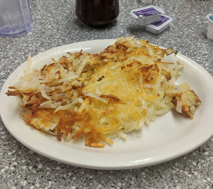 Hash browns at Fleetwood achieve the impossible trifecta: shatteringly crisp exterior, tender interior, and enough surface area to soak up whatever remains of last night's decisions.