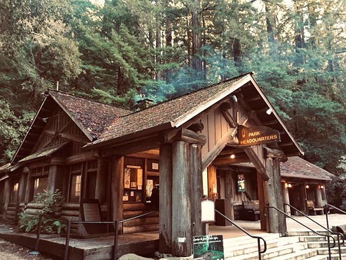 The historic Park Headquarters building stands as a testament to rustic craftsmanship, welcoming visitors with its timeless charm and practical information.