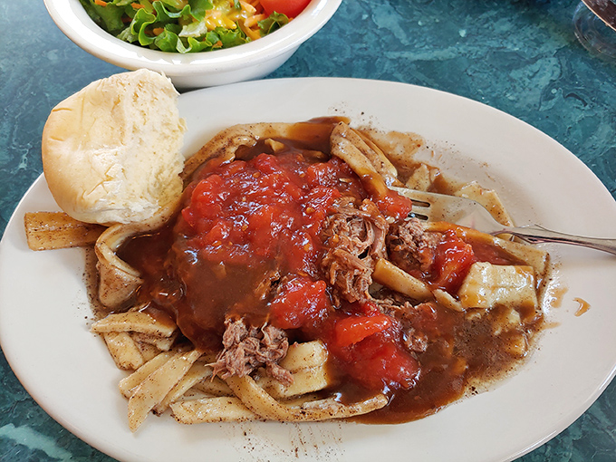 Homestyle butter noodles topped with slow-roasted beef and stewed tomatoes – like something your grandmother would make if she were Amish royalty.