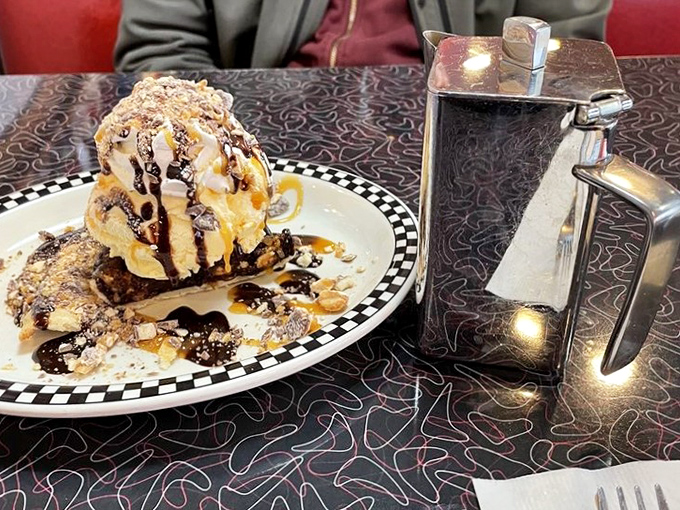 This isn't just dessert&mdash;it's therapy on a plate. Ice cream melting into warm brownie creates the kind of moment worth traveling for.