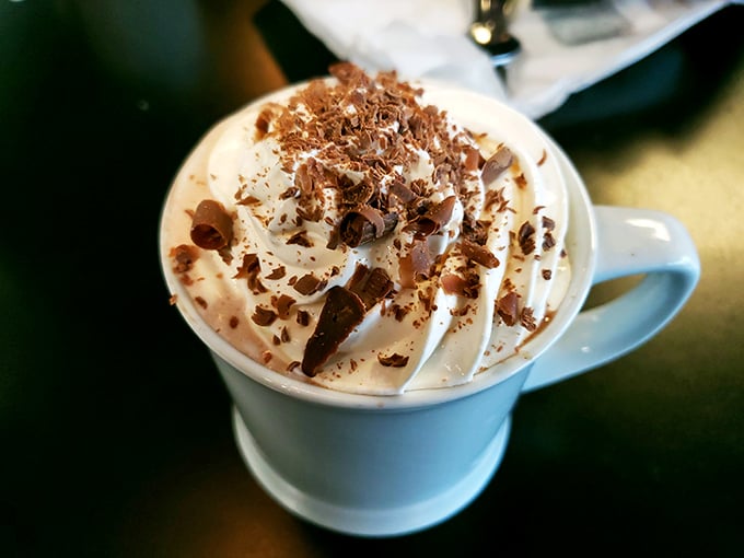 Hot chocolate that doesn't know it's not dessert, crowned with a whipped cream mountain and chocolate shavings that make adult beverages jealous. Photo credit: Julia Johnson