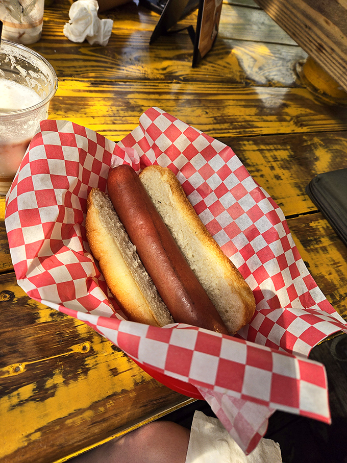 Sometimes the simplest pleasures are the best. This hot dog in its checkered paper boat is summer nostalgia on a toasted bun.