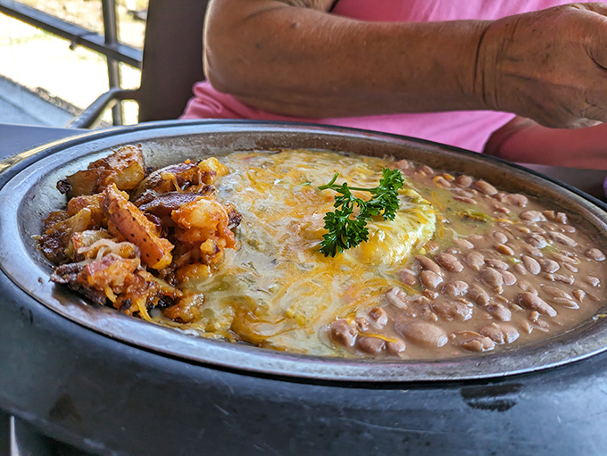 Huevos Rancheros&mdash;where eggs, chile, and beans unite in a breakfast symphony that sings "Good Morning" in perfect New Mexican harmony. 