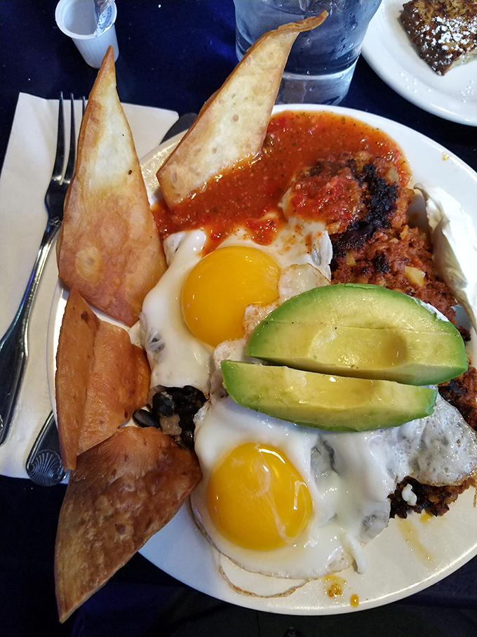 Breakfast with attitude&mdash;eggs, corned beef hash, avocado, and tortillas creating the morning alliance you didn't know you needed.