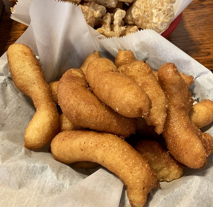 Hush puppies so perfectly golden they deserve their own trophy case&mdash;crispy exterior giving way to that steamy, tender cornmeal center.