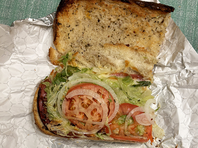 A hoagie that requires strategic eating techniques and multiple napkins. Fresh ingredients stacked with the kind of generosity that makes you feel like family.