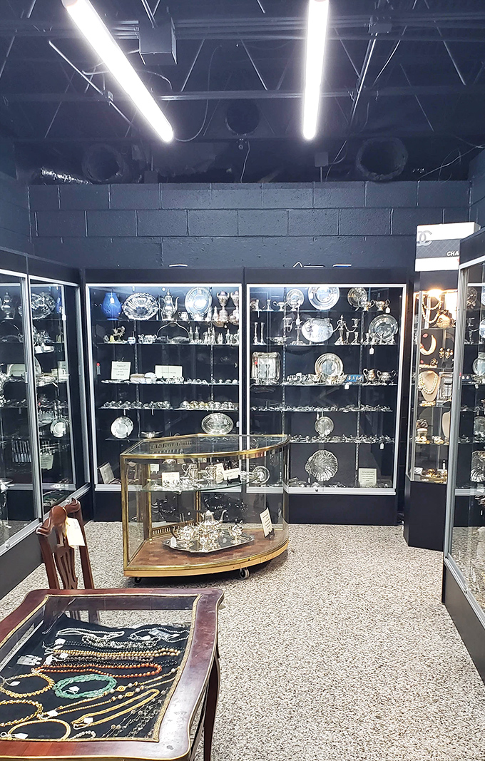 Silver treasures behind glass, waiting for their next chapter. This room sparkles with history and possibility.