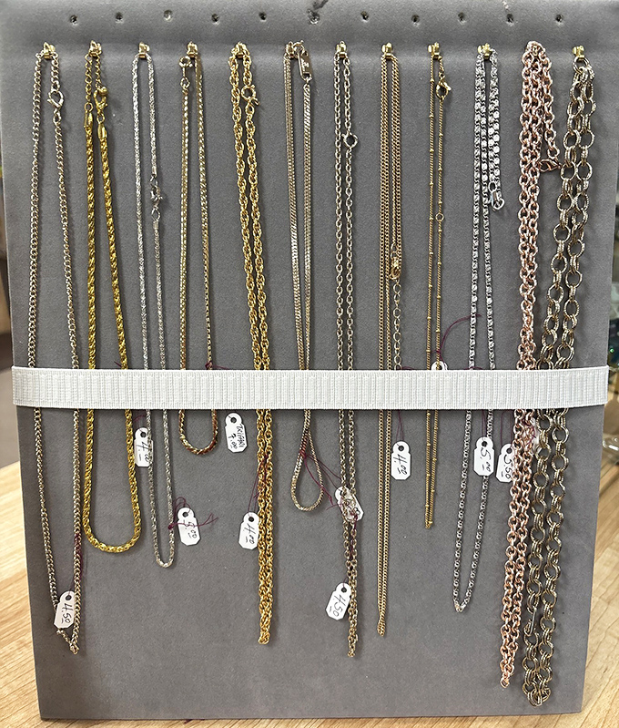 Golden chains and silver treasures dangle like a pirate's bounty waiting for rediscovery.