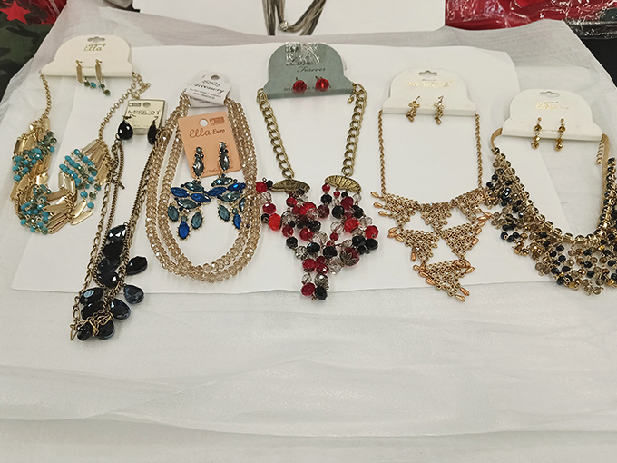 Jewelry displayed with hopeful elegance, each necklace telling a different story&mdash;like a casting call for accessories hoping to make it big.