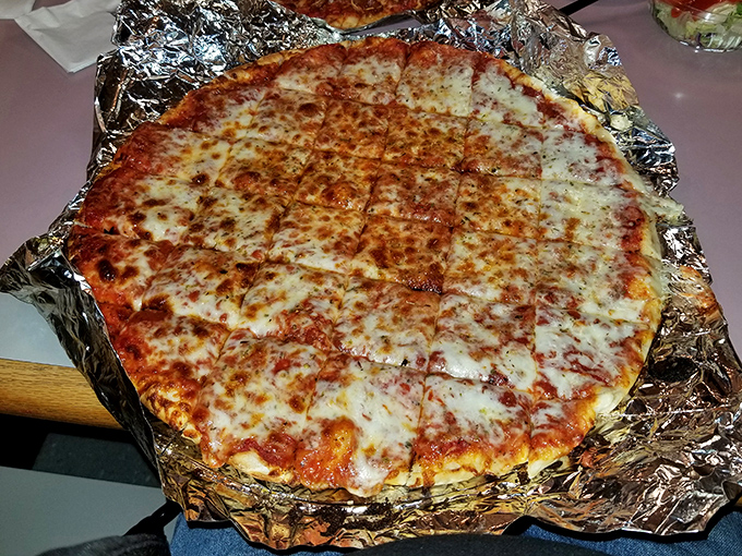 A cheese pizza so perfectly executed it makes you question why you ever thought toppings were necessary in the first place.