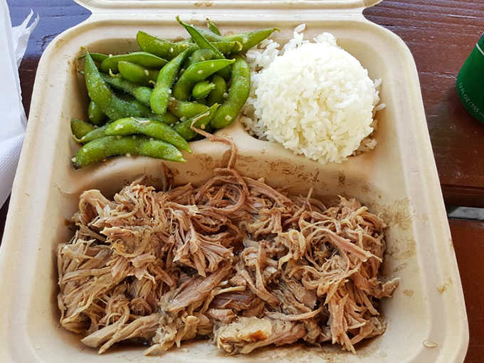 Kalua pork so tender it practically surrenders to your fork, paired with rice and edamame for a Hawaiian trifecta of satisfaction.