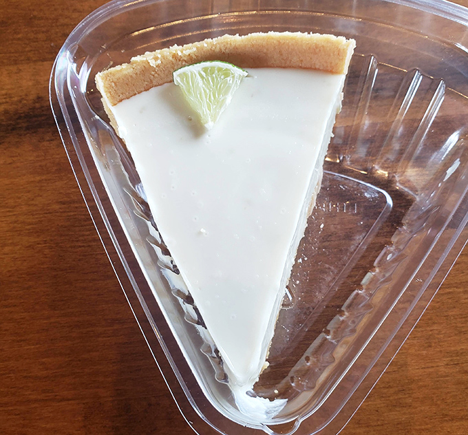 Key lime pie provides the sweet relief your taste buds need after their smoky adventure.