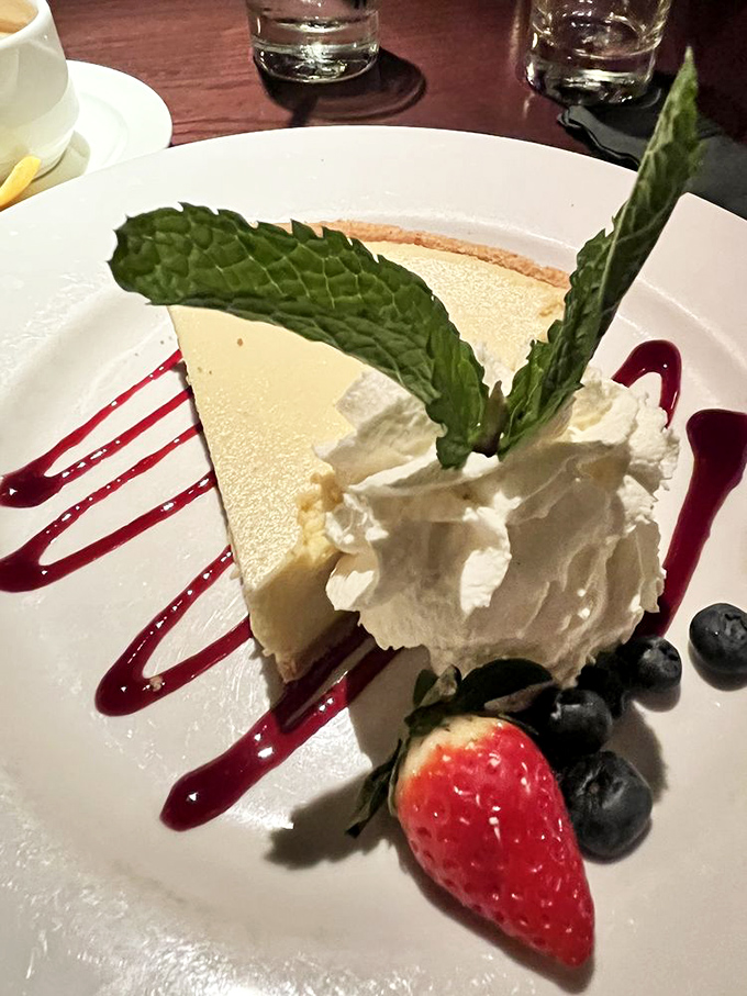 Key lime pie done right: tart enough to make your eyes widen, smooth enough to make them close in bliss. Florida on a plate.