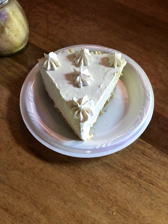 The key lime pie arrives like a celebrity&mdash;pale yellow, perfectly tart, and ready for its close-up with those adorable whipped cream dollops.
