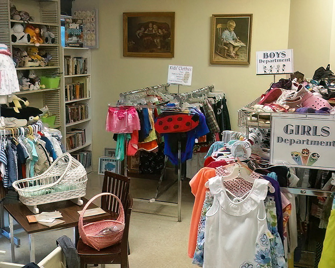 The children's department, where tiny vintage fashions tell stories of playground adventures past and future dress-up possibilities await.