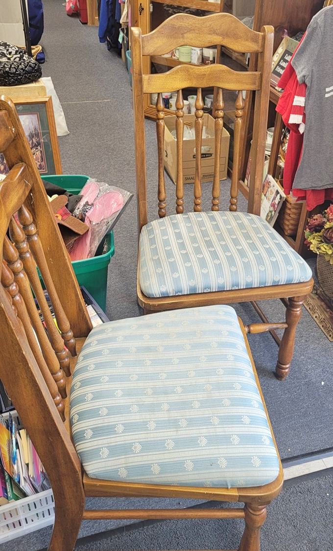 These dining chairs aren't just furniture—they're time machines to Sunday family dinners past. The blue striped upholstery has witnessed countless conversations.