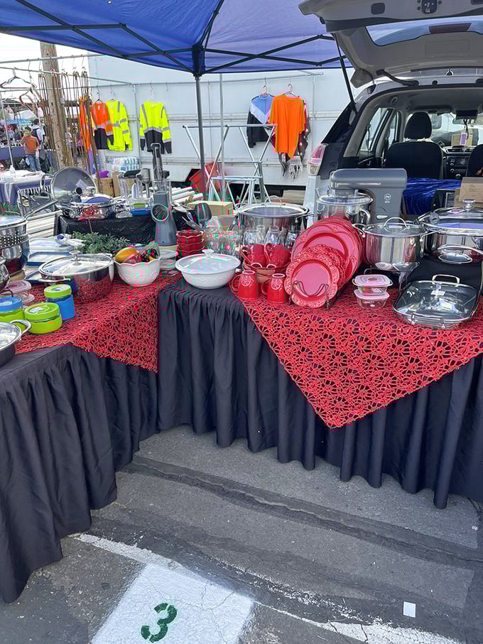 Kitchen dreams on display. This red-tablecloth wonderland of pots, pans and serving dishes would make any home chef's heart skip a beat.