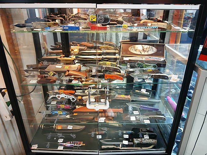 Behind glass, blades of every shape and purpose gleam with possibility. One person's cutting tool is another's conversation piece.