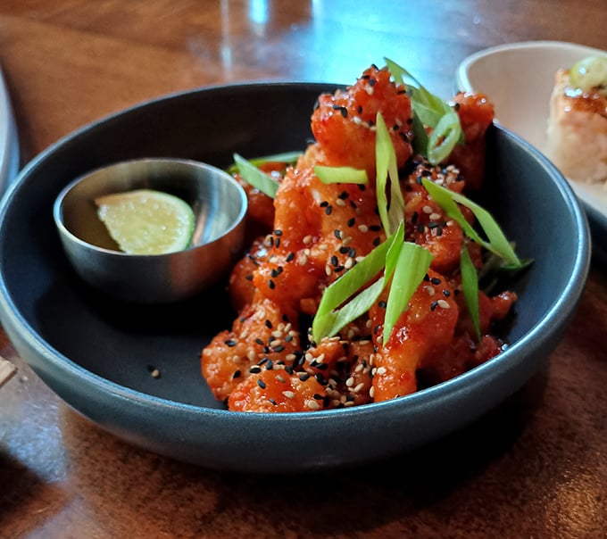 Korean fried cauliflower that might make you forget chicken wings exist&mdash;crispy, sticky, and sprinkled with enough sesame seeds to make you feel virtuous.