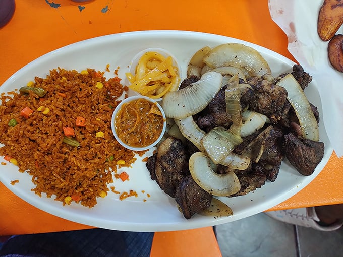 Lamb debbe with jollof rice and caramelized onions proves that comfort food speaks every language when done this right.