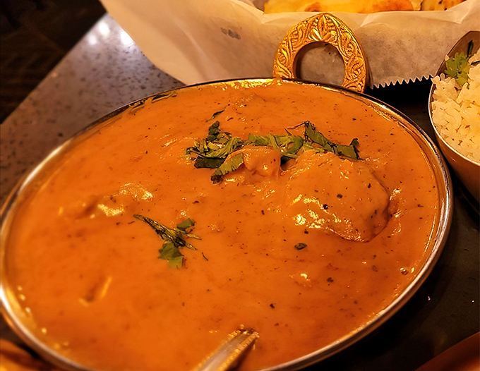 Lamb korma swimming in luxury, making your Tuesday night feel like a special occasion.