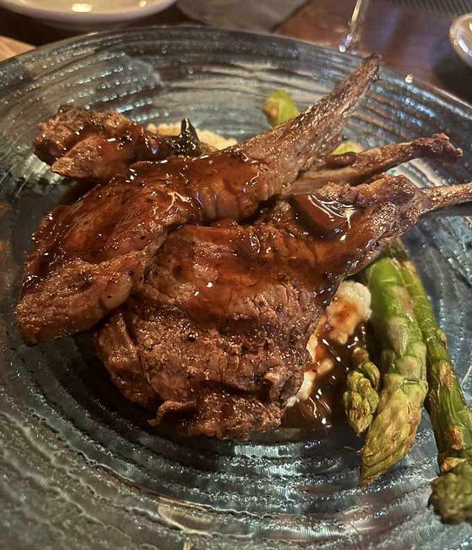 Lamb chops so perfectly executed they deserve their own Broadway show. Served with asparagus that actually makes you want to eat your vegetables. 