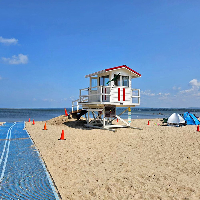 The lifeguard tower stands ready, like a beach superhero's headquarters minus the cape but with all the responsibility.