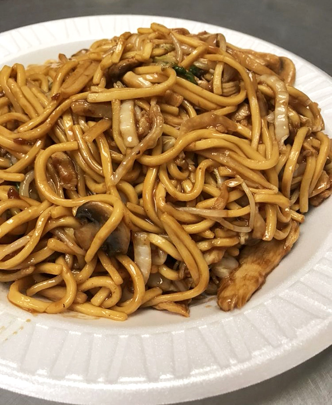 Lo mein that doesn't know the meaning of "clumpy" &ndash; each noodle distinct yet working in perfect harmony, like a well-rehearsed orchestra of carbs.