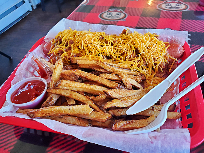 Chili cheese fries that could unite rival football fans. That mountain of cheese isn't just a topping – it's a commitment to excellence.
