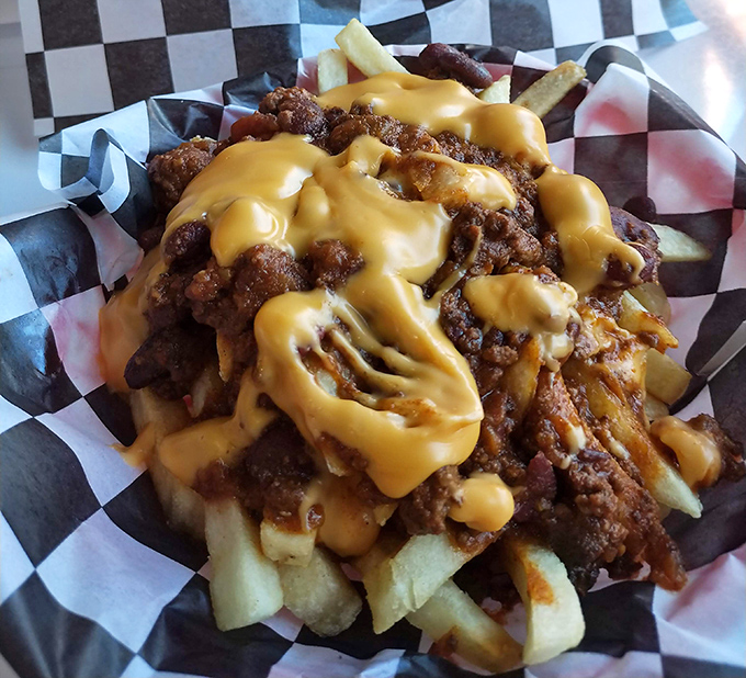 Chili cheese fries aren't just a side dish here&mdash;they're an architectural achievement, a mountain of comfort that requires both fork and commitment.