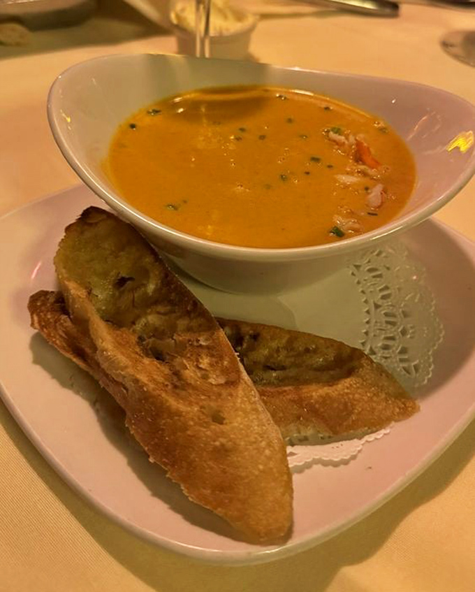 Golden bisque with crusty bread soldiers standing at attention &ndash; comfort food that went to finishing school.