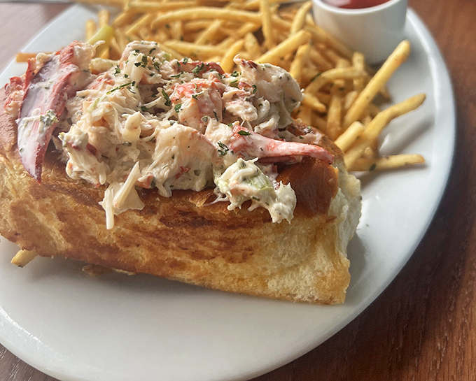 The lobster roll&mdash;where Maine tradition meets Washington execution in a buttery, toasty embrace that's worth every napkin.