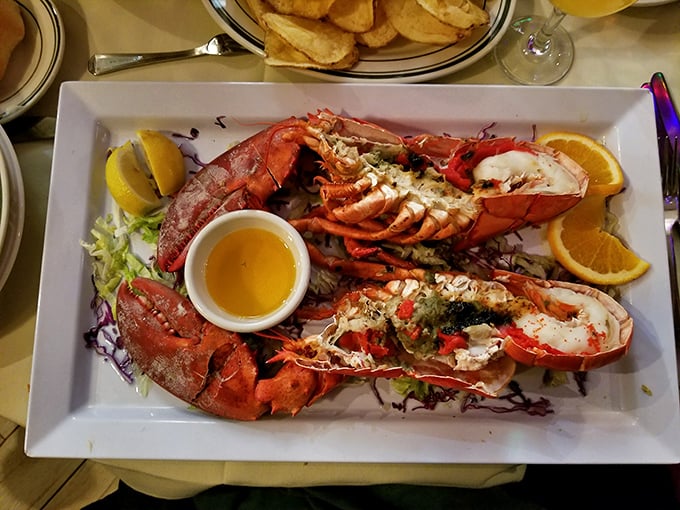 Ocean royalty on a plate. These lobster tails aren't just seafood; they're a statement piece accessorized with citrus and melted butter.