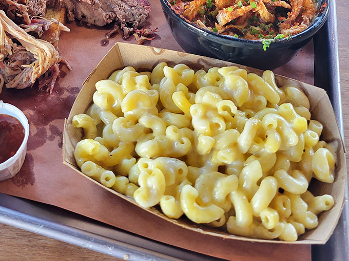 Mac and cheese that doesn't apologize for its simplicity &ndash; just perfectly cooked pasta swimming in a golden pool of cheese that whispers, "Dive in."