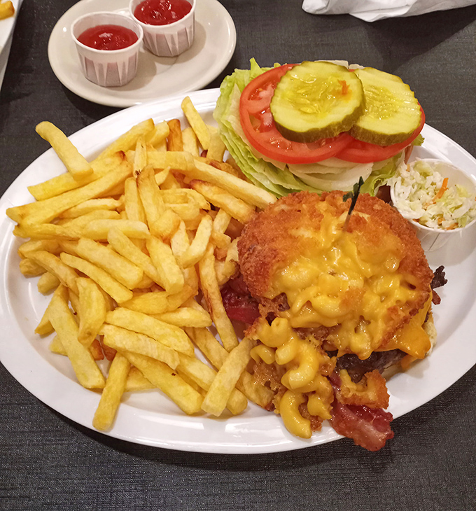 A burger that answers the eternal question: "What if mac and cheese had a dream about becoming a topping?" Spoiler alert: dreams come true.