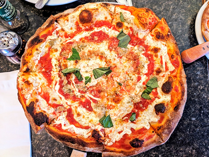 The Margherita pizza&mdash;proof that simplicity is the ultimate sophistication. That char on the crust is what pizza dreams are made of.