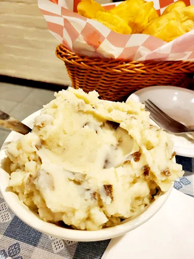 These mashed potatoes aren't whipped into submission by some fancy machine &ndash; they've got character, texture, and enough butter to make your cardiologist wince.