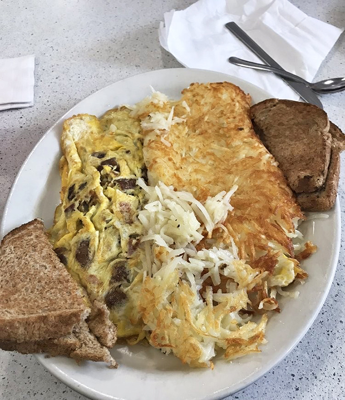 The omelette and hashbrown combo that makes you understand why breakfast enthusiasts speak of Morg's in hushed, reverential tones.