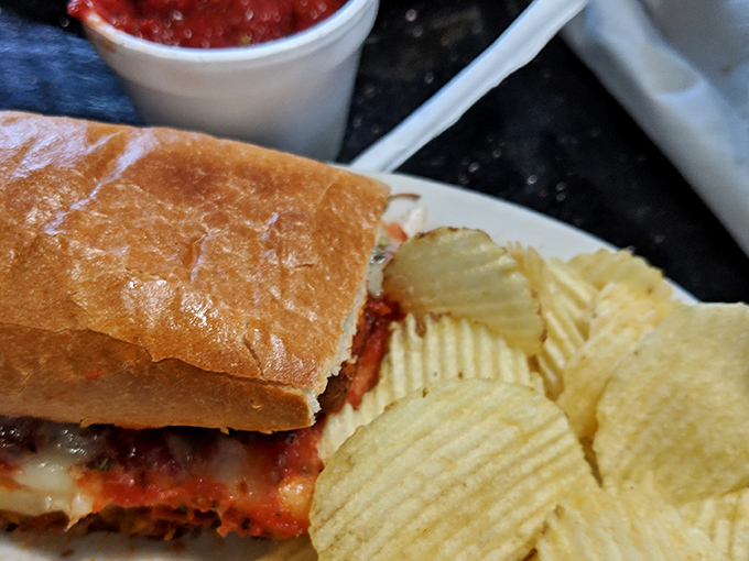 This isn't just a sandwich; it's an architectural marvel of bread, sauce, and melted cheese that demands both respect and napkins.
